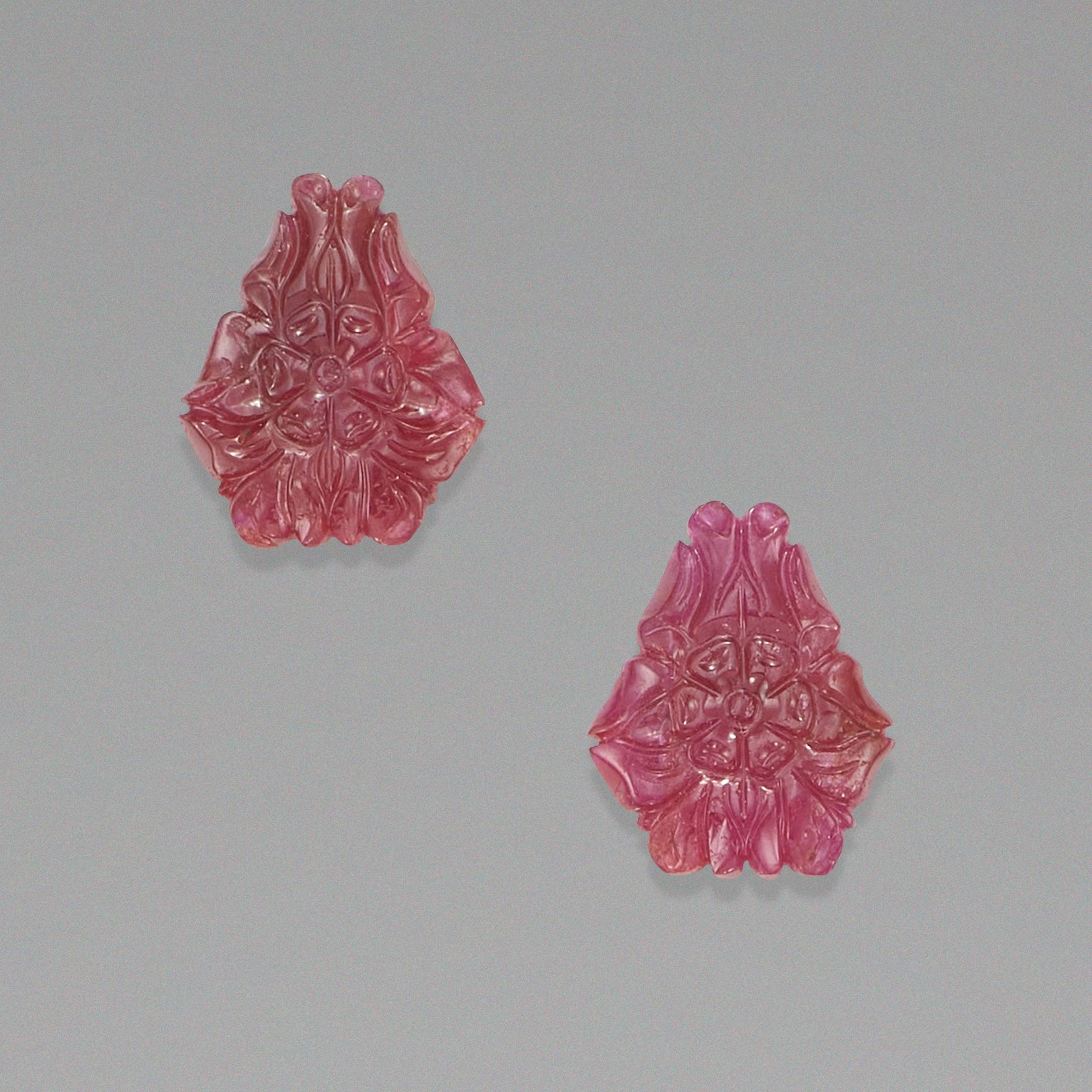 Bonhams : Pair of Carved Ruby Plaques