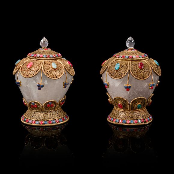 Bonhams : Two Covered Urns with Filigree Decoration