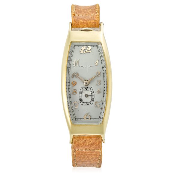 Bonhams : MOVADO. AN UNUSUAL 18K GOLD CURVED RECTANGULAR WRISTWATCH ...