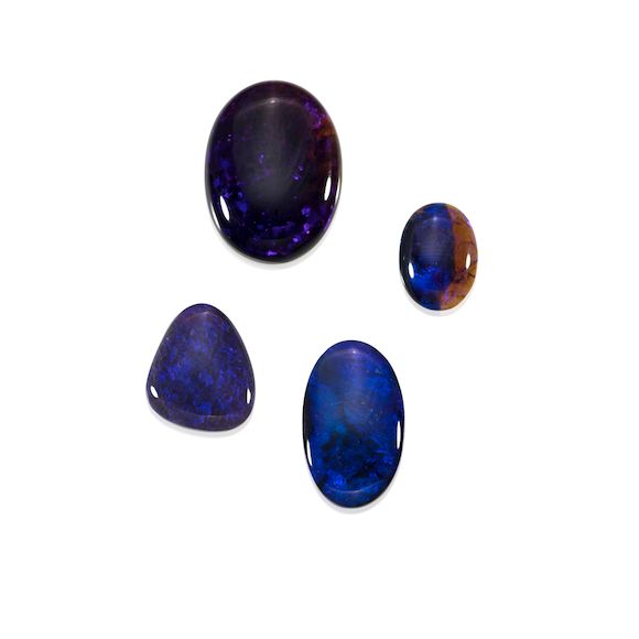 Bonhams : Four Black Opals with Blue Play-of-Color