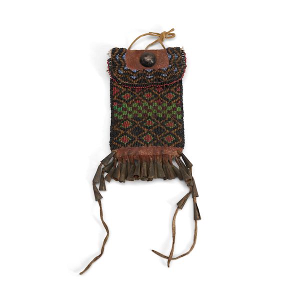 Bonhams Skinner : An Apache beaded hide pouch lg. 6 1/2, wd. 3 1/2 in.