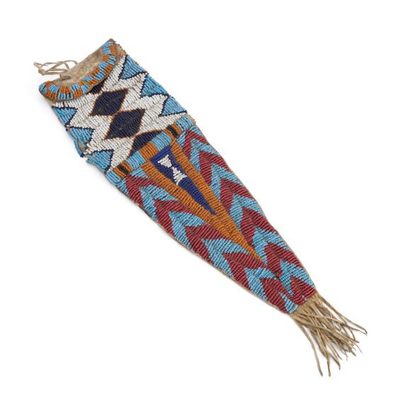 Bonhams Skinner : A Northern Plains beaded hide tab bag lg. 14, wd. 3 3 ...