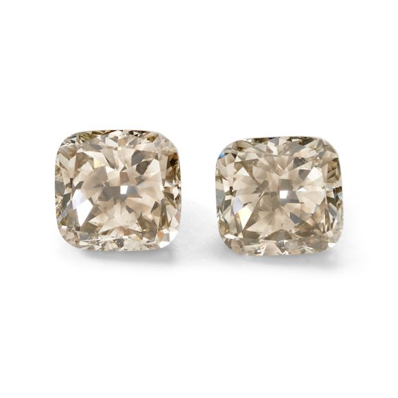 Bonhams Skinner : A PAIR OF UNMOUNTED COLORED DIAMONDS