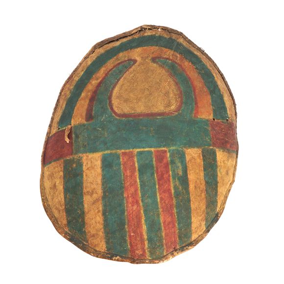 Bonhams Skinner : A painted Pueblo buffalo hide shield dia. 17 in.