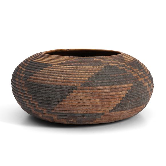 Bonhams Skinner : A small Pomo basket ht. 2 1/2, wd. 6 1/2 in.