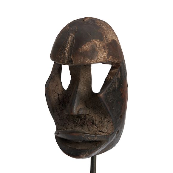 Bonhams Skinner : A Dan mask ht. 7 3/4, wd. 3 3/4 in.