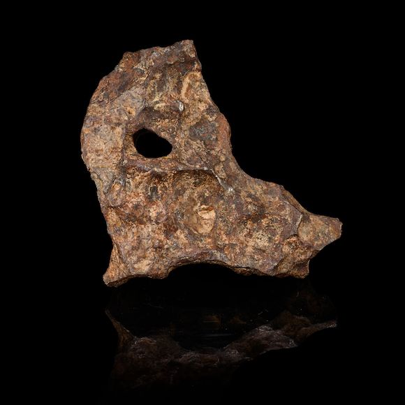 Bonhams : Canyon Diablo Meteorite--Complete Individual with Hole