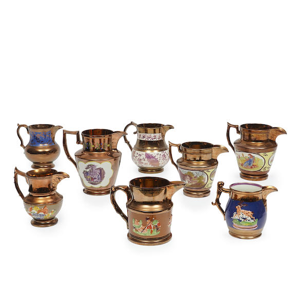 Bonhams Skinner Eight Copper Lustre Pottery Pitchers