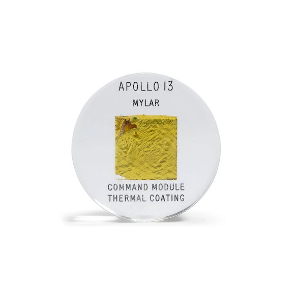 Bonhams : APOLLO 13 FLOWN KAPTON FOIL ENCASED IN PERIOD LUCITE DISC ...