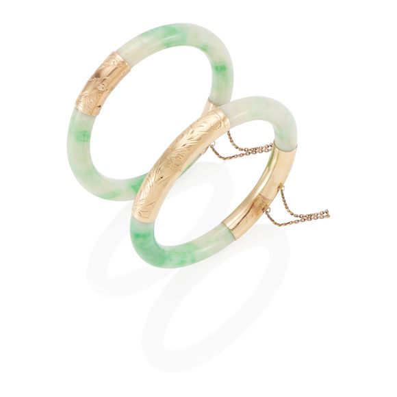 Bonhams : TWO 14K GOLD AND JADE BANGLES