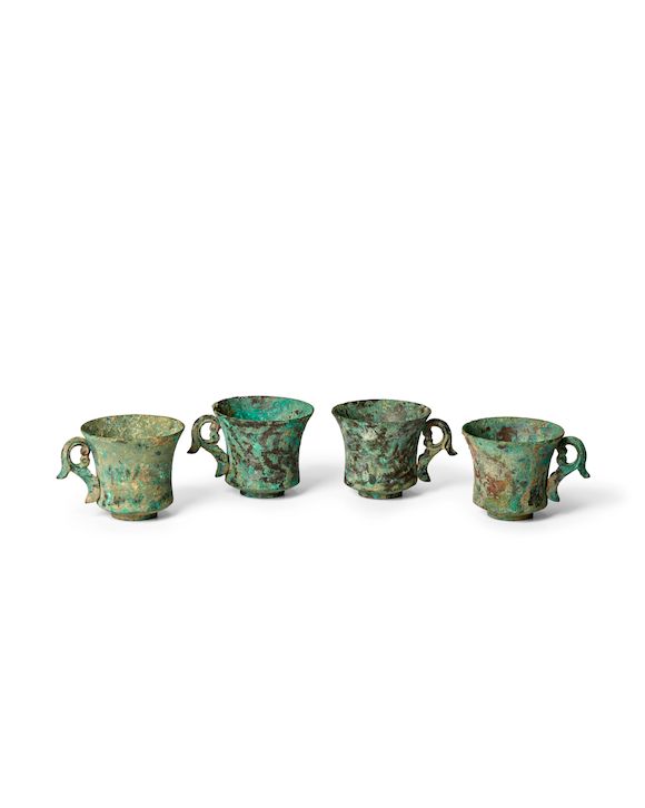 Bonhams : A GROUP OF FOUR BRONZE CUPS Tang Dynasty (4)