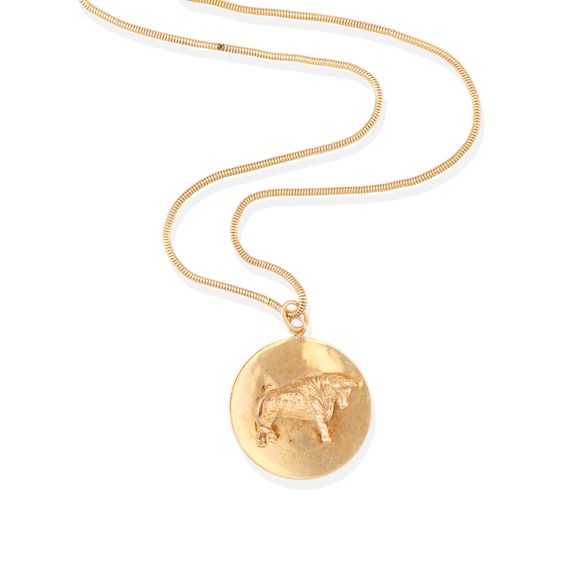 Bonhams : A 14K GOLD TAURUS PENDANT NECKLACE