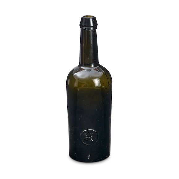 Bonhams Skinner : A Sealed 'Cylinder' Wine Bottle, circa 1840-60,