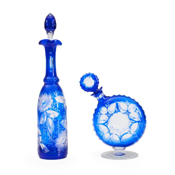 Bonhams Skinner : Two Bohemian Blue Overlay Glass Decanters, 19th/20th century,