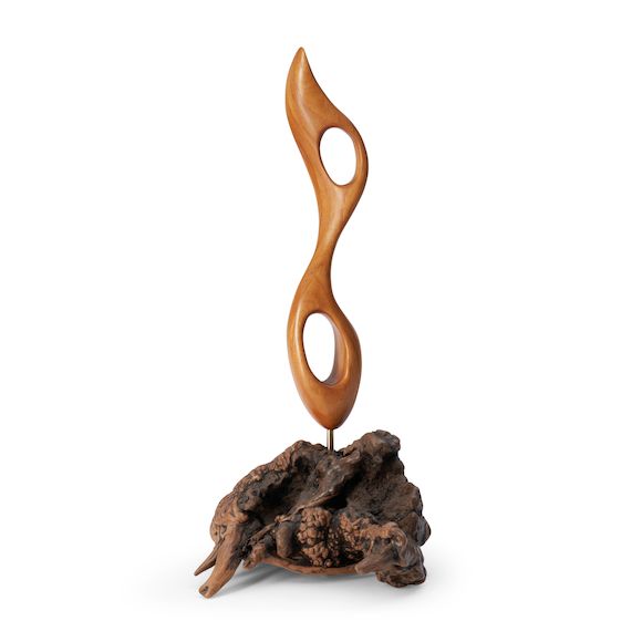 Bonhams Skinner : ABSTRACT WALNUT SCULPTURE ON ROOT WOOD BASE