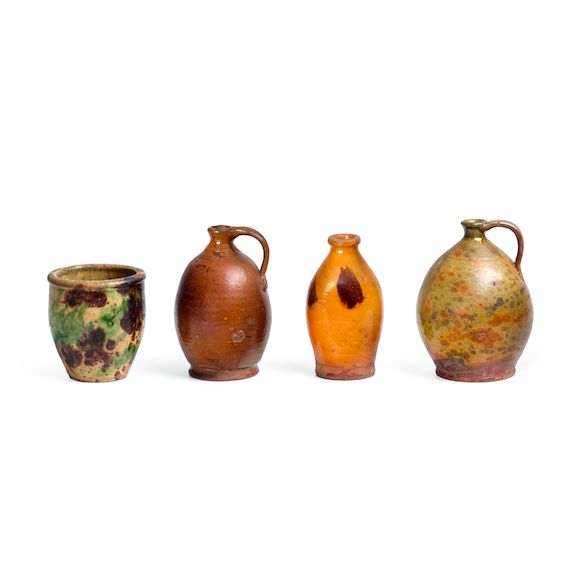 Bonhams Skinner : Four Glazed Redware Items, America, 19th century.