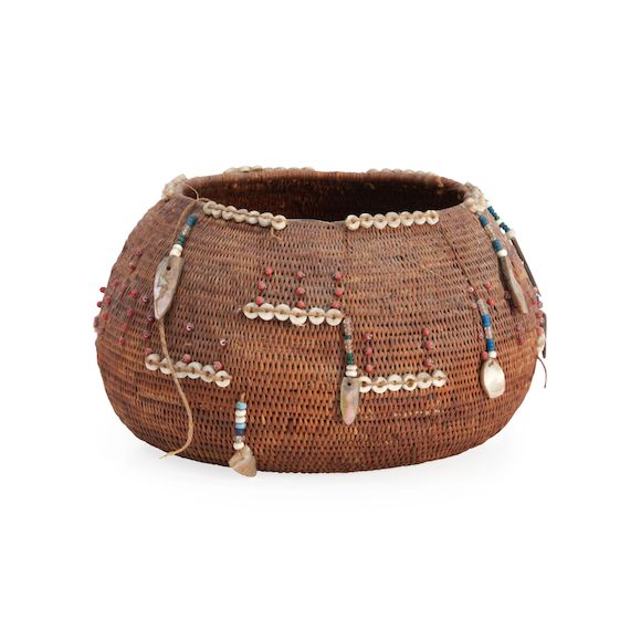 Bonhams Skinner : A Pomo basket with shells h. 3 1/2, wd. 6 in.