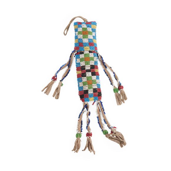 Bonhams Skinner : A Mescalero Apache fully beaded whetstone case lg. with drops 8 3/4, lg. of ...