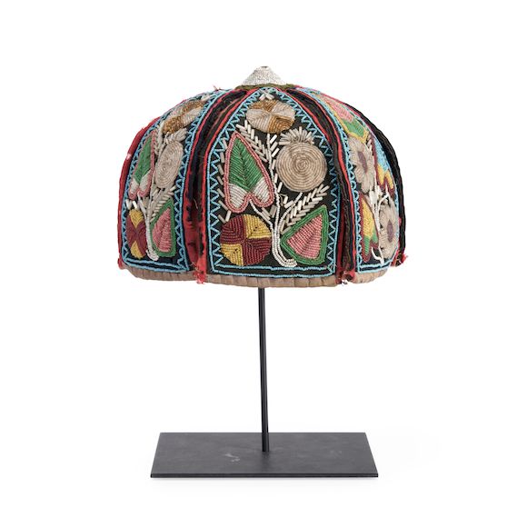 Bonhams Skinner : A Northeast beaded cloth cap ht. 5 1/2, wd. 6 1/2 in.