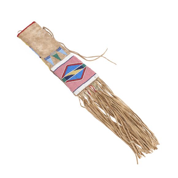 Bonhams Skinner : A Apsáalooke (Crow) beaded hide pipe bag overall lg ...