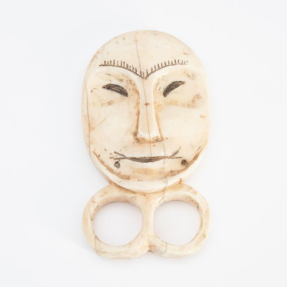 Bonhams Skinner : An Eskimo finger mask lg. 3 7/8 in.