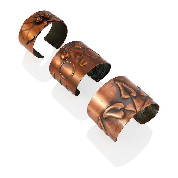 Bonhams : REBAJES: THREE COPPER CUFF BRACELETS, CIRCA 1950'S