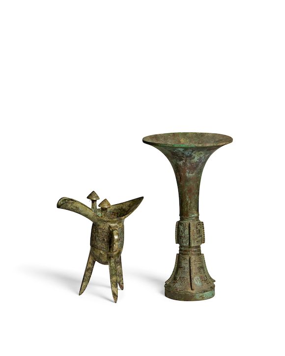 Bonhams : TWO ARCHAIC BRONZE RITUAL WINE VESSELS, GU AND JUE Shang ...