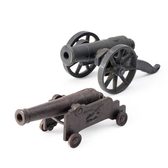 Bonhams Skinner : Two Miniature Cast Iron Cannon.