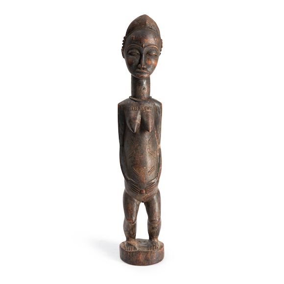 Bonhams Skinner : A Baule female figure ht. 22 3/4 in.