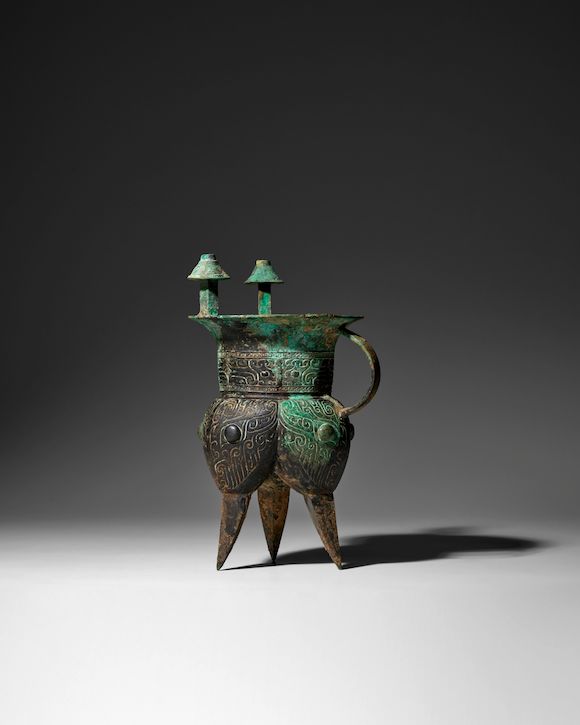 Bonhams : AN ARCHAIC BRONZE TRIPOD VESSEL, JIA Shang Dynasty