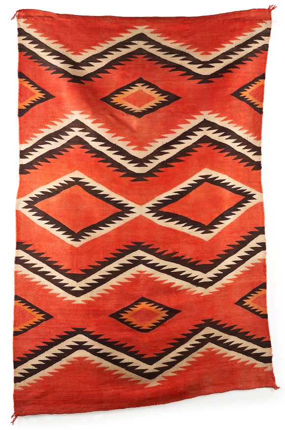 Bonhams Skinner : A Diné (Navajo) transitional weaving 70 x 45 in.