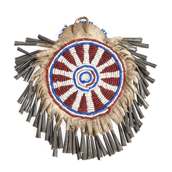 Bonhams Skinner : An Apache beaded hide pouch lg. 6, wd. 5 1/2 in.