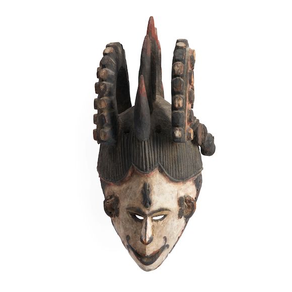 Bonhams Skinner : An Ibo Maiden Spirit helmet mask Agbogho Mmuo ht. 16 ...