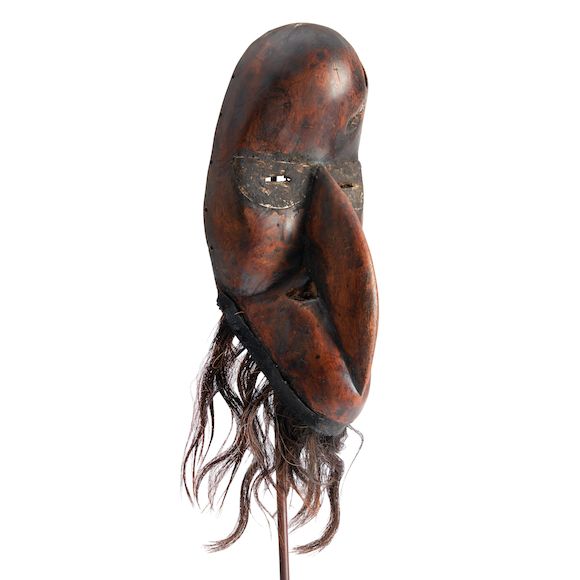 Bonhams Skinner : A Dan Ge Gon mask lg. 13 1/2 in.