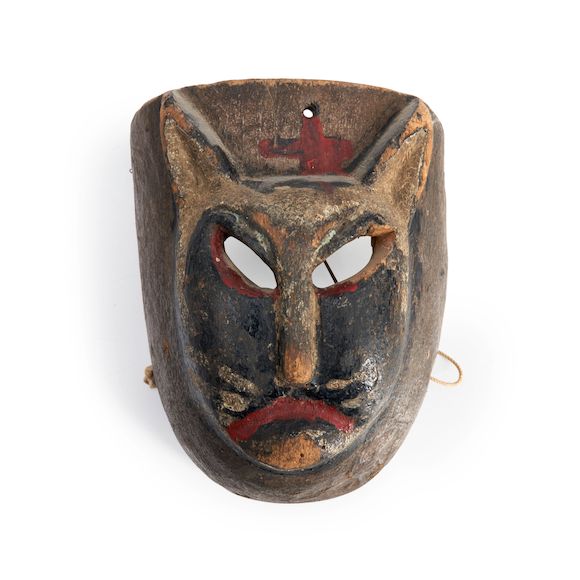 Bonhams Skinner : A polychrome Mexican mask ht. 7 1/2, wd. 5 3/4 in.