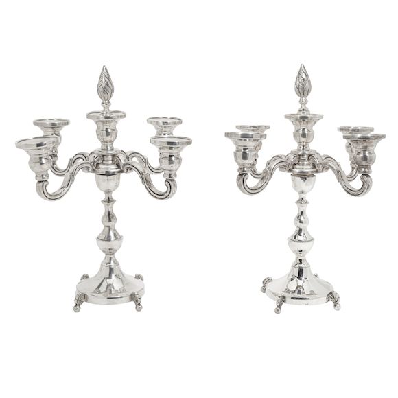 Bonhams : TWO SIMILAR STERLING SILVER WEIGHTED FIVE-LIGHT CANDELABRA one marked LM