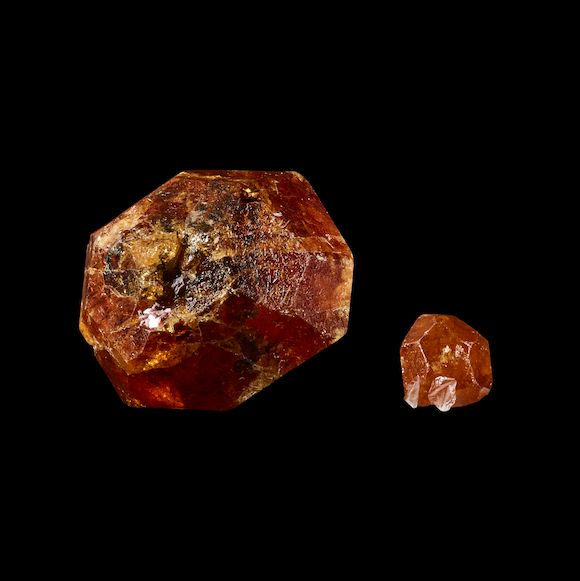 Bonhams : Two Spessartite Garnets on Acrylic Bases