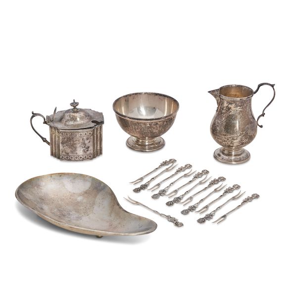 Bonhams Skinner : FOUR PIECES OF STERLING SILVER HOLLOWWARE