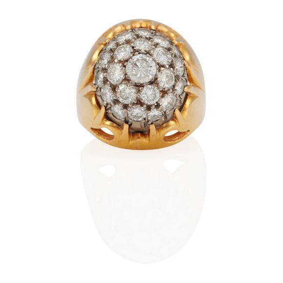 Bonhams : A 21K GOLD, WHITE METAL AND DIAMOND RING