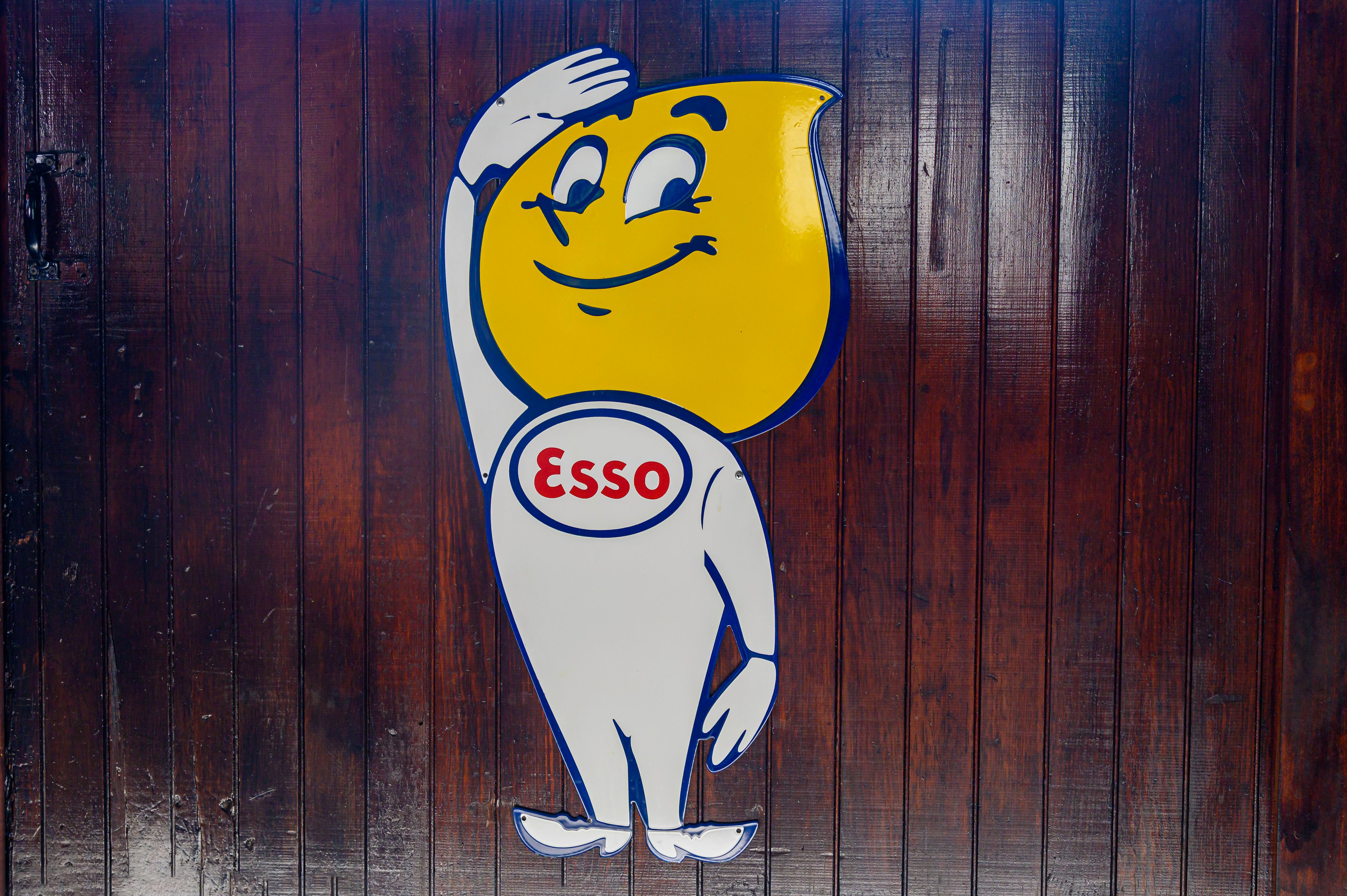 Bonhams Cars : Two Esso "Mr. Drip" Saluting Signs, together with a ...