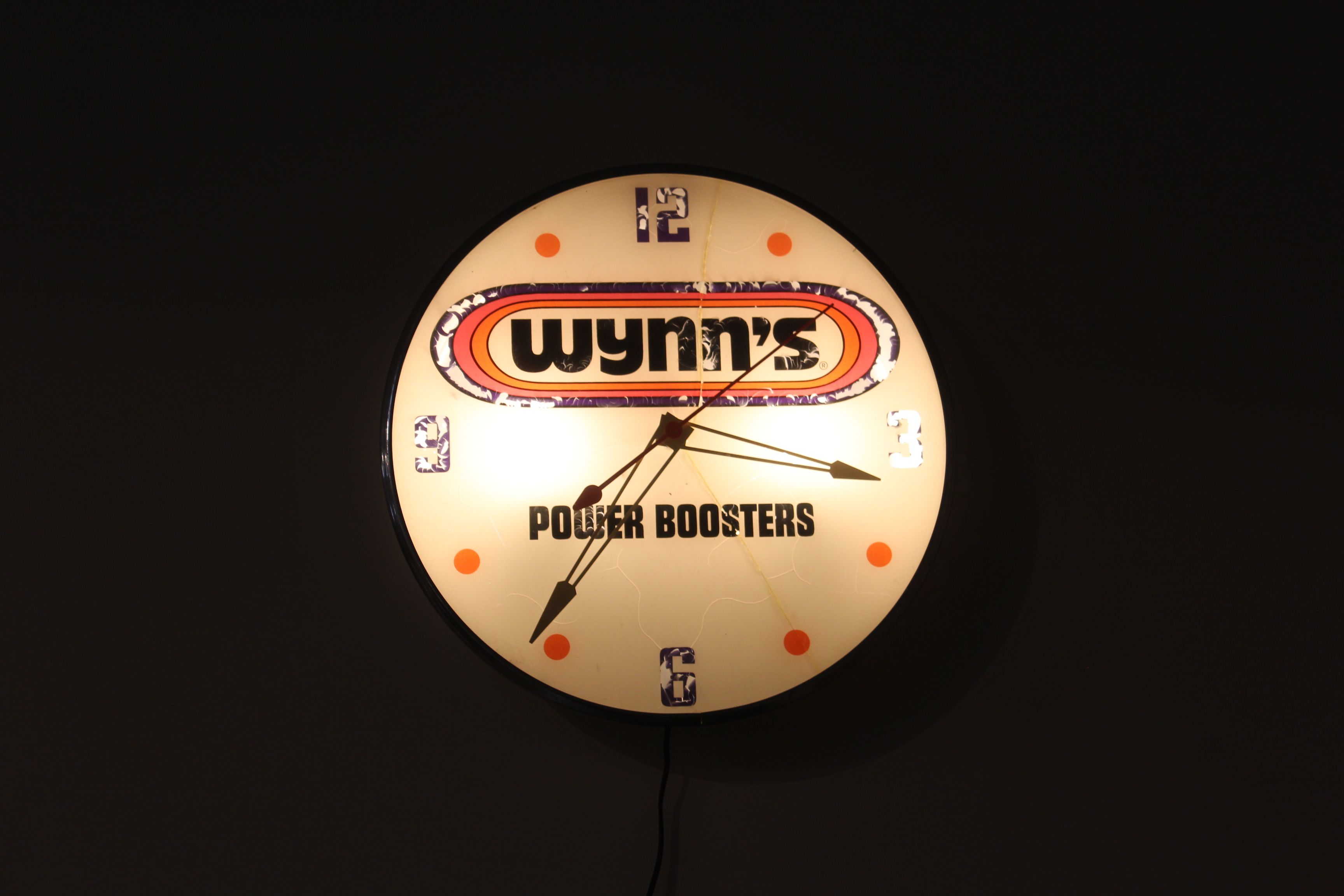 Bonhams Cars : An Illuminated Wynn's Power Booster PAM Shop Clock