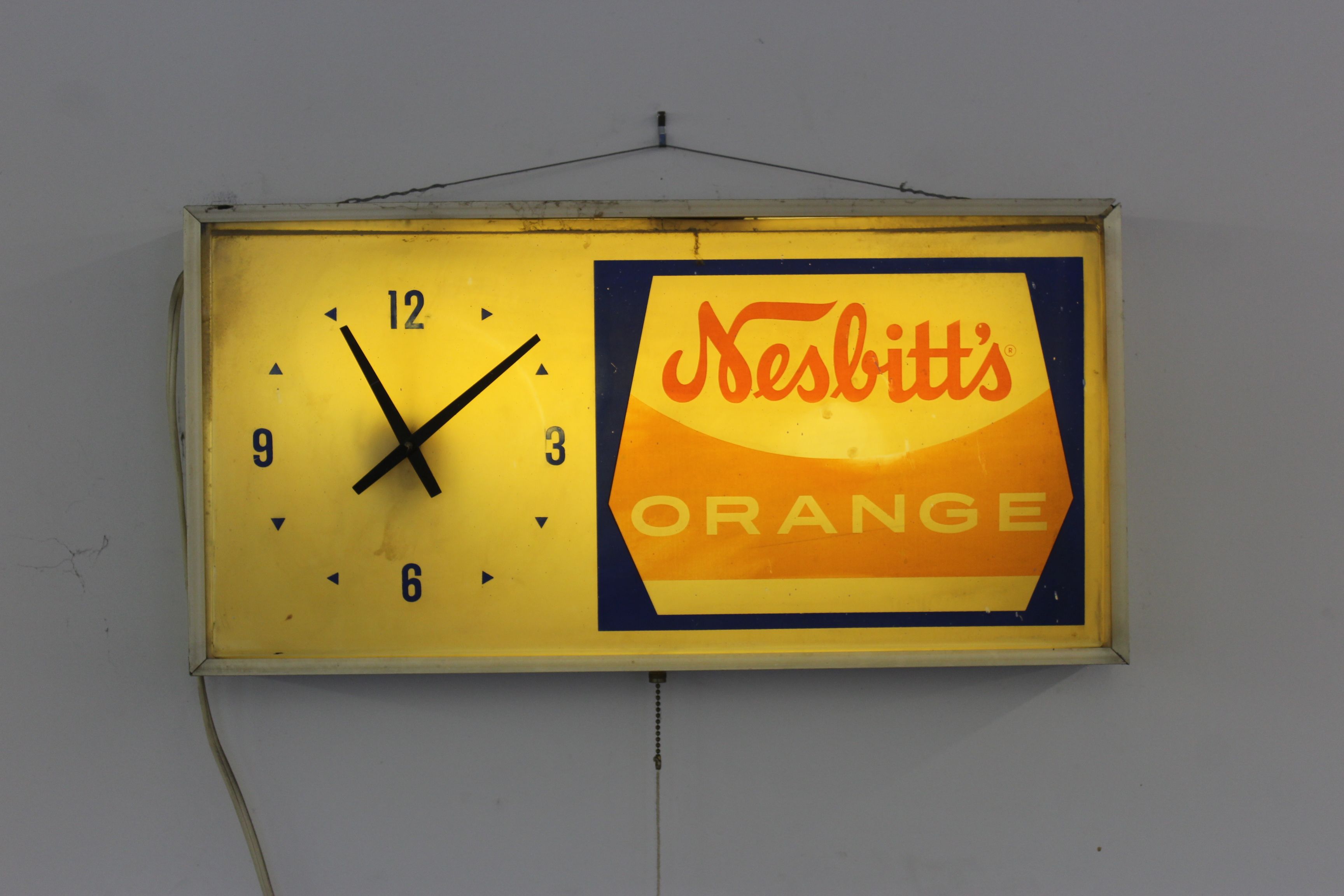 Bonhams Cars : An Illuminated Nesbitt's Orange Soda Advertising Clock