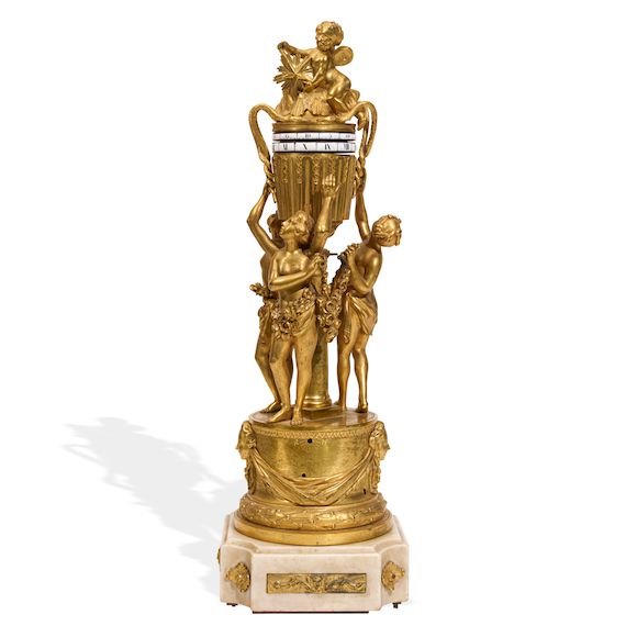 Bonhams : A FRENCH GILT BRASS, BRONZE AND MARBLE FIGURAL ORBIT ...