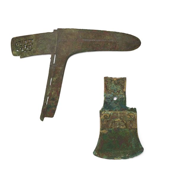 Bonhams : TWO CAST BRONZE WEAPONS, A YUE AXE HEAD AND A GE HALBERD The ...