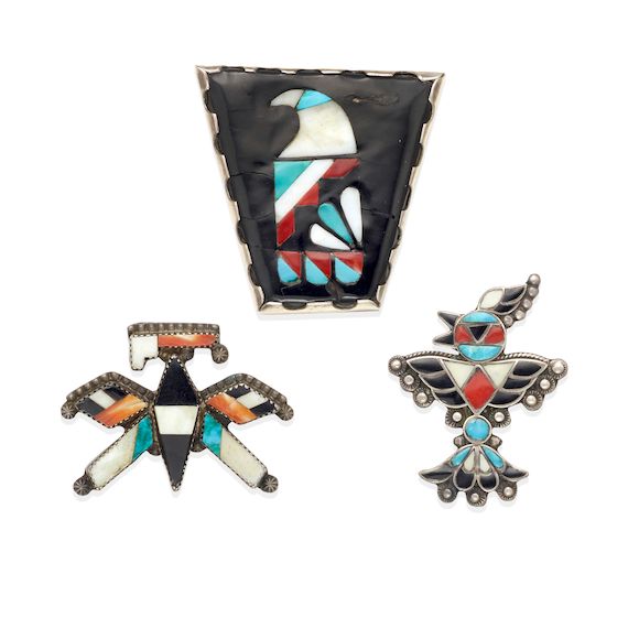 Bonhams : Three Zuni bird-motif pins, one by Frank Vacit