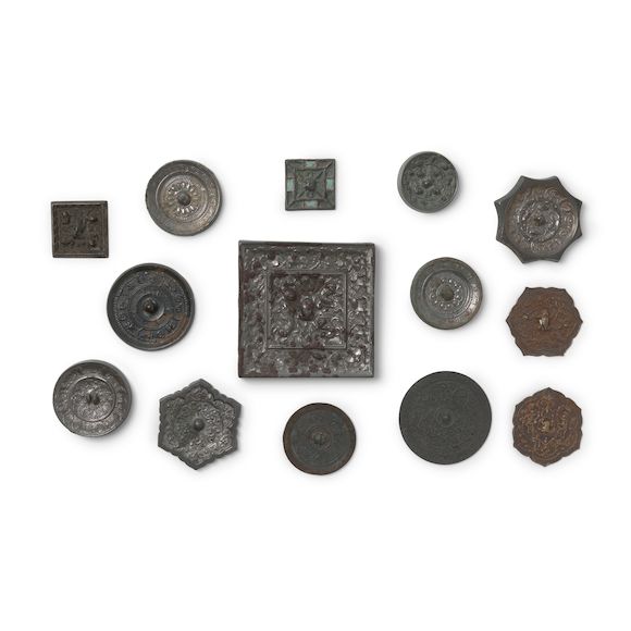 Bonhams : TWELVE MINIATURE BRONZE MIRRORS AND TWO PARCEL-GILT BRONZE ...