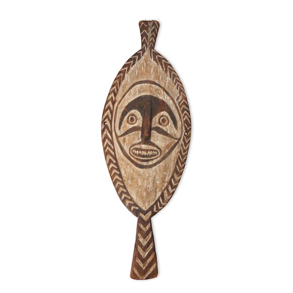 Bonhams Skinner : A New Guinea Spirit Board kwoi ht. 31 in.