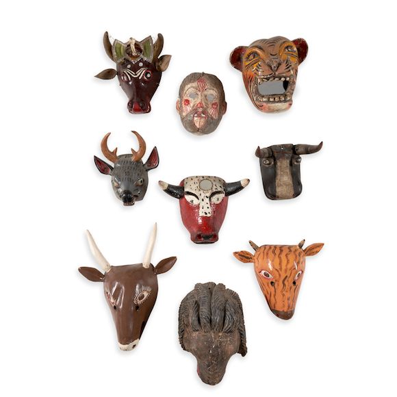 Bonhams Skinner : NINE CARVED AND PAINTED MASKS