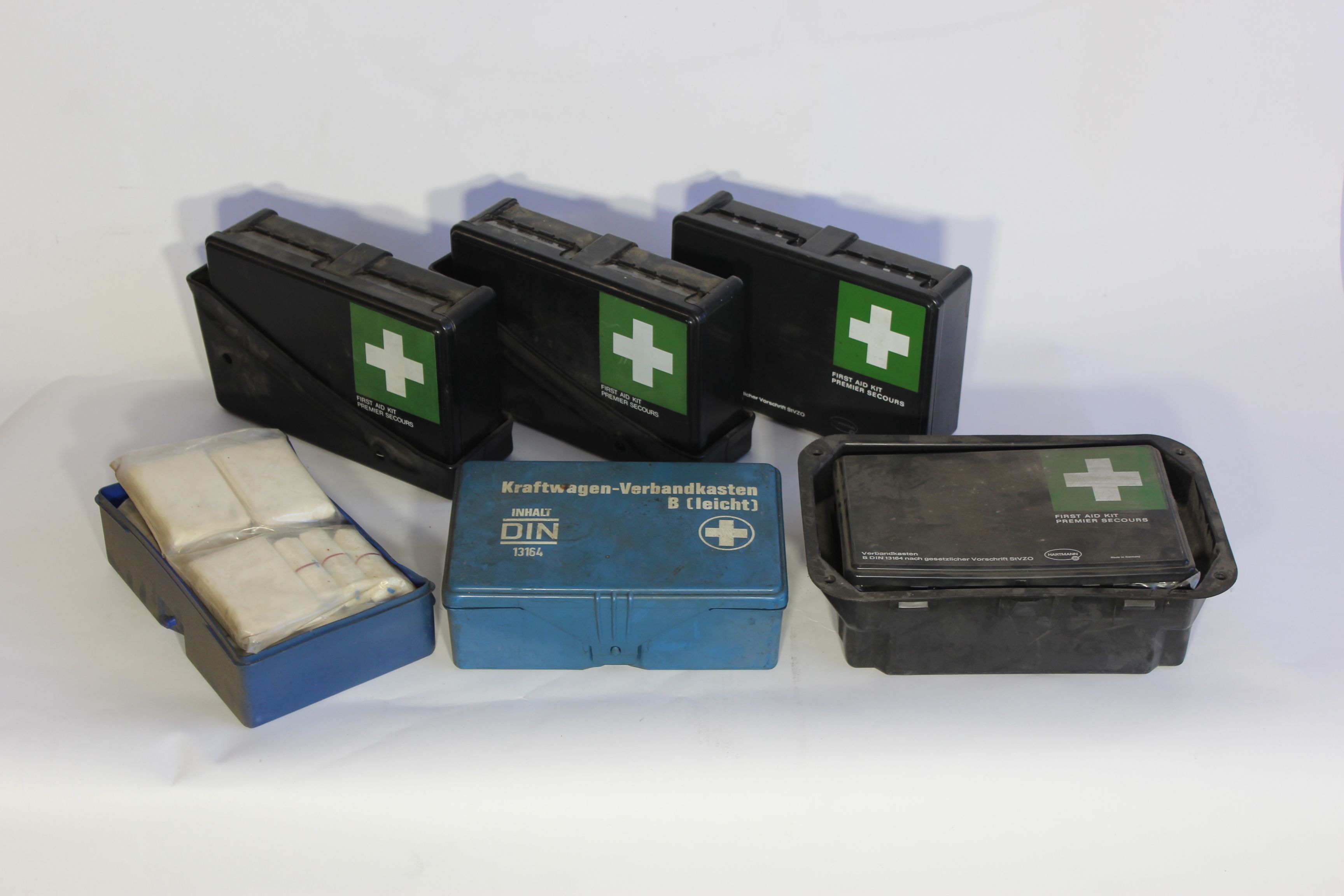 Bonhams Cars : A group of 6 First-Aid kits 10 inches in height, 14 ...