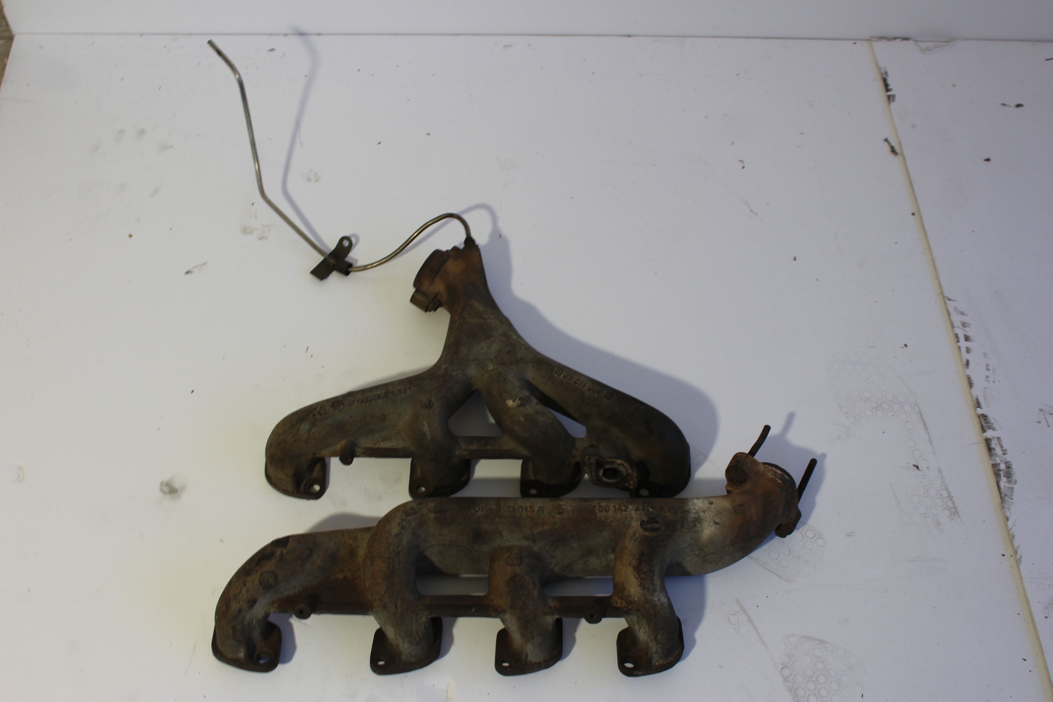 Bonhams Cars : A set of exhaust manifolds M100 6.9 3 inches in height ...